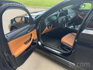 Black BMW 520 2021 in Riga, with an engine capacity of 2.00 L and mileage of 209 thousand km for 24000 €, photo 11 on AUTOMOTO.COM.LV