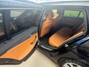 Black BMW 520 2021 in Riga, with an engine capacity of 2.00 L and mileage of 209 thousand km for 24000 €, photo 14 on AUTOMOTO.COM.LV