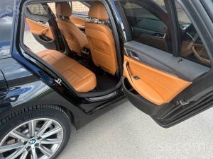Black BMW 520 2021 in Riga, with an engine capacity of 2.00 L and mileage of 209 thousand km for 24000 €, photo 15 on AUTOMOTO.COM.LV