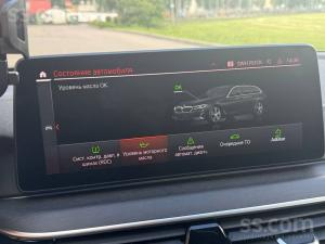 Black BMW 520 2021 in Riga, with an engine capacity of 2.00 L and mileage of 209 thousand km for 24000 €, photo 23 on AUTOMOTO.COM.LV