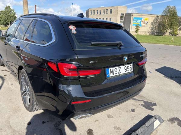 Black BMW 520 2021 in Vilnius, with an engine capacity of 2.00 L and mileage of 202 thousand km for 24000 €, photo 9 on AUTOMOTO.COM.LV