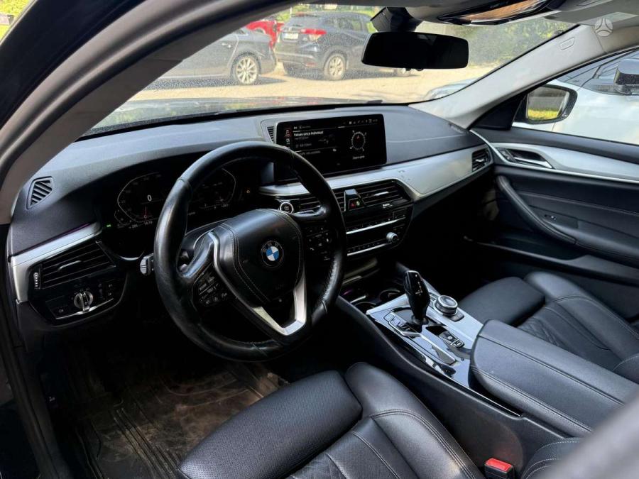Black BMW 520 2022 in Vilnius, with an engine capacity of 2.00 L and mileage of 182 thousand km for 14900 €, photo 4 on AUTOMOTO.COM.LV
