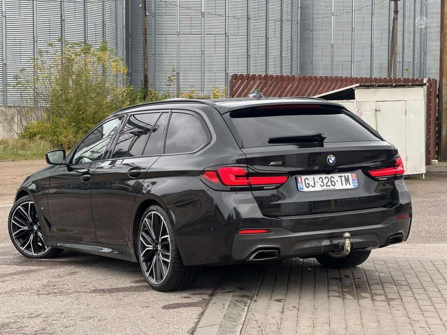 Black BMW 520 2022 in Ukmerge, with an engine capacity of 2.00 L and mileage of 230 thousand km for 22500 €, photo 11 on AUTOMOTO.COM.LV