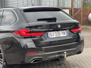 Black BMW 520 2022 in Ukmerge, with an engine capacity of 2.00 L and mileage of 230 thousand km for 22500 €, photo 12 on AUTOMOTO.COM.LV