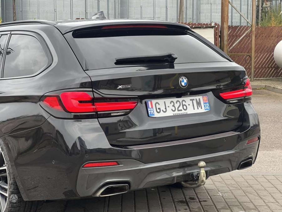 Black BMW 520 2022 in Ukmerge, with an engine capacity of 2.00 L and mileage of 230 thousand km for 22500 €, photo 12 on AUTOMOTO.COM.LV