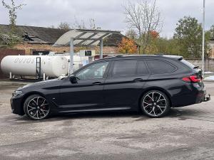 Black BMW 520 2022 in Ukmerge, with an engine capacity of 2.00 L and mileage of 230 thousand km for 22500 €, photo 14 on AUTOMOTO.COM.LV