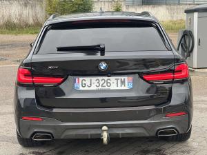 Black BMW 520 2022 in Ukmerge, with an engine capacity of 2.00 L and mileage of 230 thousand km for 22500 €, photo 18 on AUTOMOTO.COM.LV