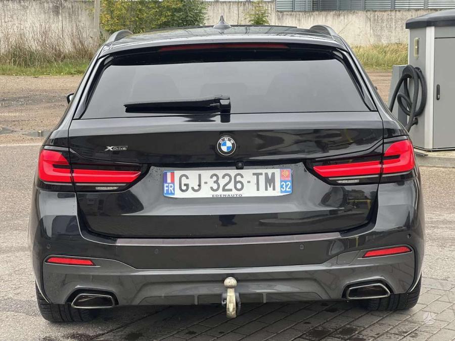 Black BMW 520 2022 in Ukmerge, with an engine capacity of 2.00 L and mileage of 230 thousand km for 22500 €, photo 18 on AUTOMOTO.COM.LV