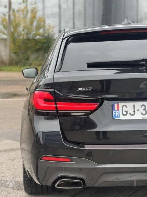 Black BMW 520 2022 in Ukmerge, with an engine capacity of 2.00 L and mileage of 230 thousand km for 22500 €, photo 19 on AUTOMOTO.COM.LV