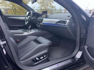 Black BMW 520 2022 in Ukmerge, with an engine capacity of 2.00 L and mileage of 230 thousand km for 22500 €, photo 21 on AUTOMOTO.COM.LV