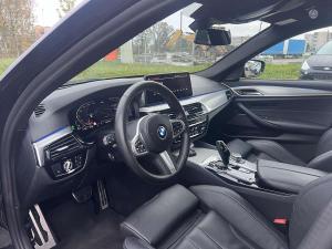 Black BMW 520 2022 in Ukmerge, with an engine capacity of 2.00 L and mileage of 230 thousand km for 22500 €, photo 22 on AUTOMOTO.COM.LV