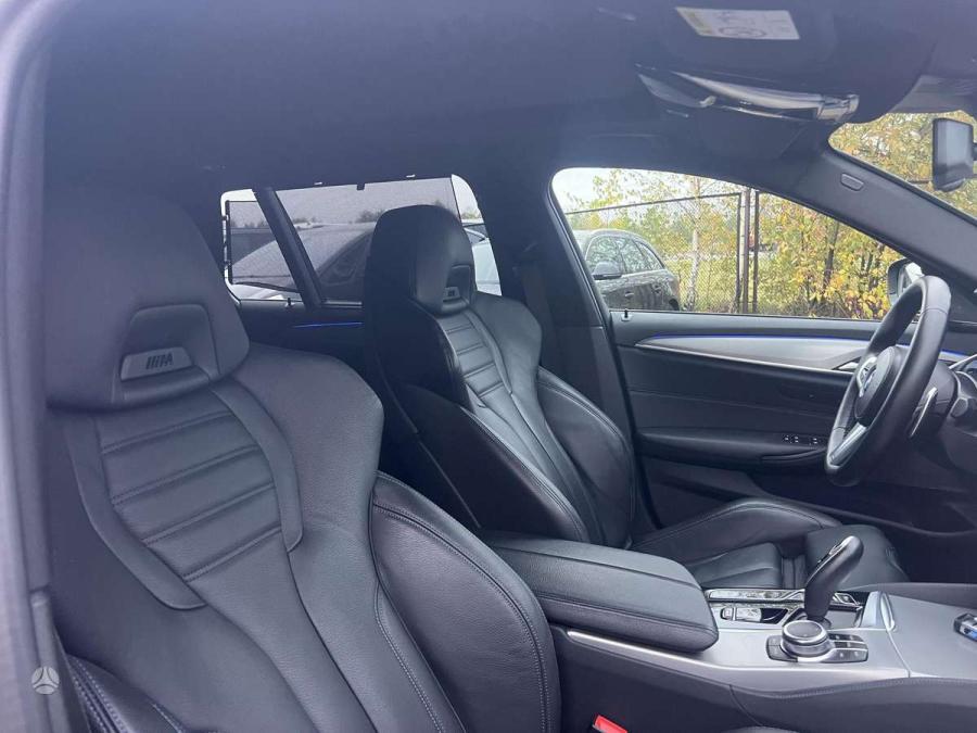Black BMW 520 2022 in Ukmerge, with an engine capacity of 2.00 L and mileage of 230 thousand km for 22500 €, photo 23 on AUTOMOTO.COM.LV