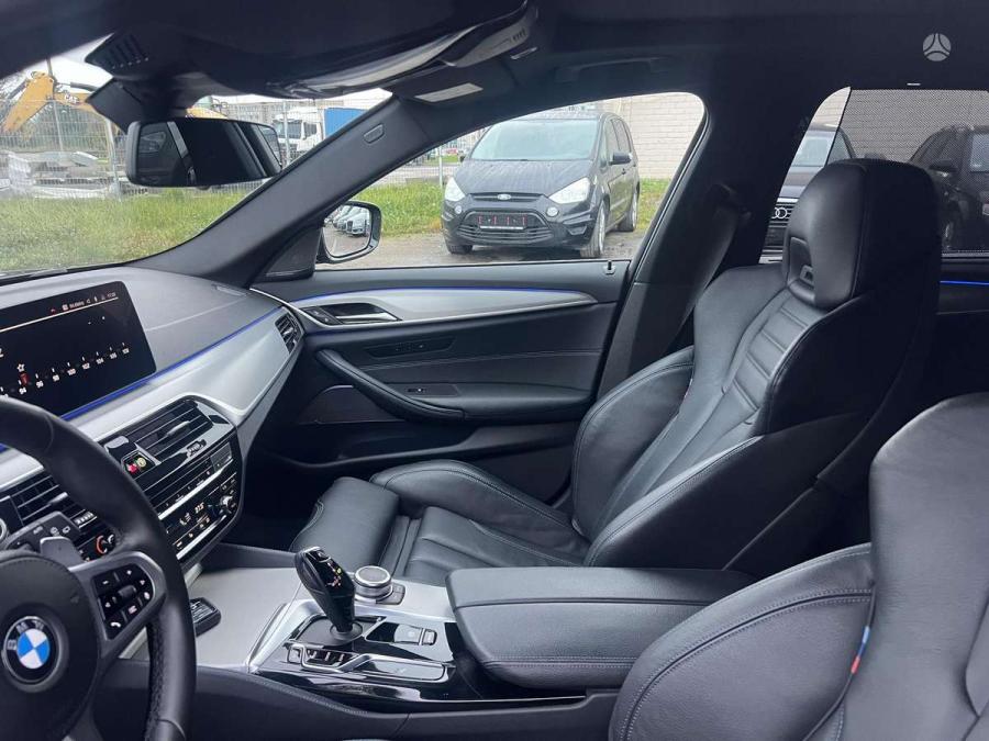 Black BMW 520 2022 in Ukmerge, with an engine capacity of 2.00 L and mileage of 230 thousand km for 22500 €, photo 24 on AUTOMOTO.COM.LV