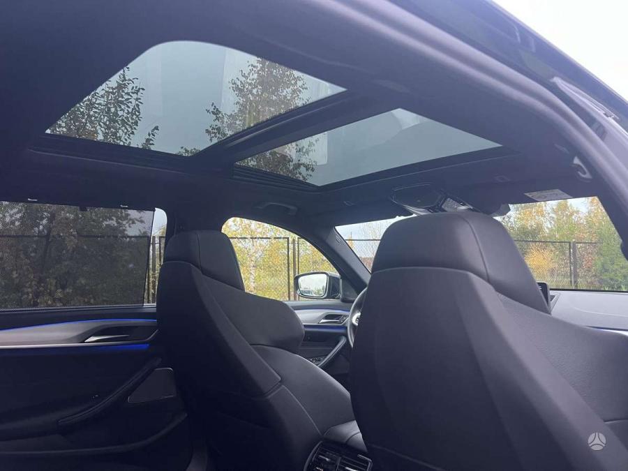 Black BMW 520 2022 in Ukmerge, with an engine capacity of 2.00 L and mileage of 230 thousand km for 22500 €, photo 29 on AUTOMOTO.COM.LV