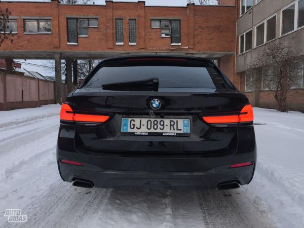 Black BMW 520 2023 in Siauliai, with an engine capacity of 2.00 L and mileage of 180 thousand km for 34999 €, photo 6 on AUTOMOTO.COM.LV