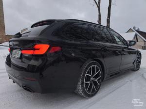 Black BMW 520 2023 in Siauliai, with an engine capacity of 2.00 L and mileage of 180 thousand km for 34999 €, photo 24 on AUTOMOTO.COM.LV