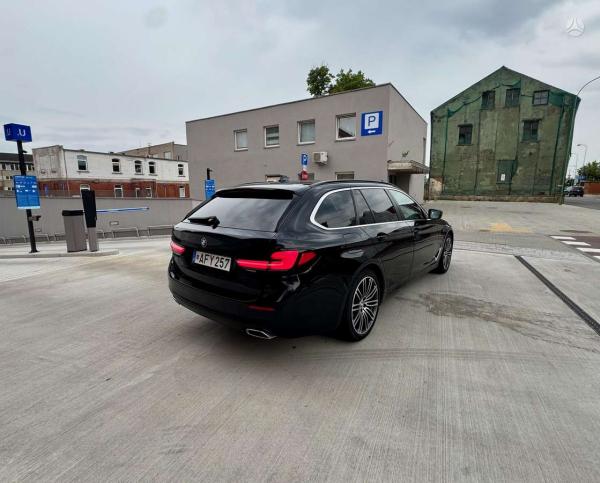 Black BMW 520 2023 in Klaipeda, with an engine capacity of 2.00 L and mileage of 99 thousand km for 28500 €, photo 3 on AUTOMOTO.COM.LV