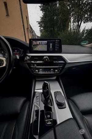 Black BMW 520 2023 in Klaipeda, with an engine capacity of 2.00 L and mileage of 99 thousand km for 28500 €, photo 17 on AUTOMOTO.COM.LV