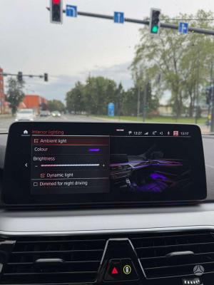 Black BMW 520 2023 in Klaipeda, with an engine capacity of 2.00 L and mileage of 99 thousand km for 28500 €, photo 26 on AUTOMOTO.COM.LV