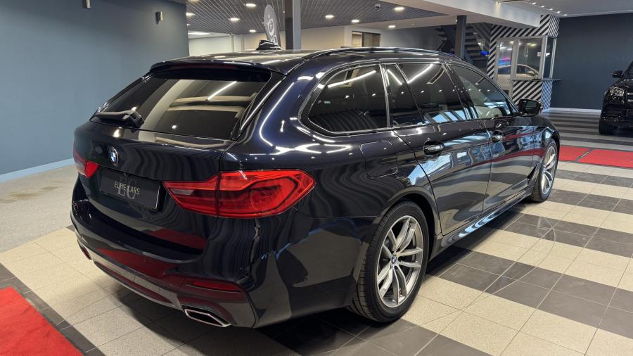 Blue BMW 520 2017 in Riga, with an engine capacity of 2.00 L and mileage of 163 thousand km for 18490 €, photo 5 on AUTOMOTO.COM.LV