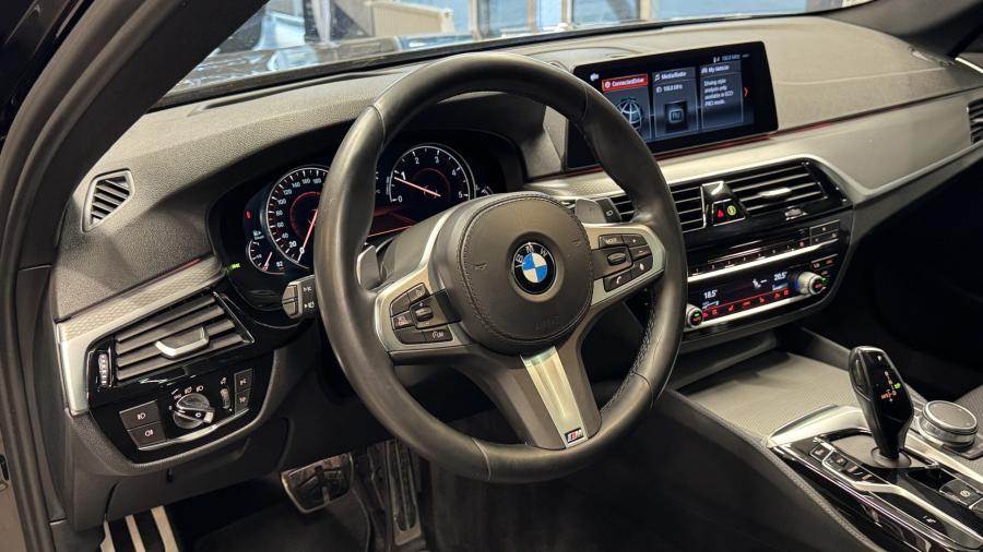 Blue BMW 520 2017 in Riga, with an engine capacity of 2.00 L and mileage of 163 thousand km for 18490 €, photo 24 on AUTOMOTO.COM.LV