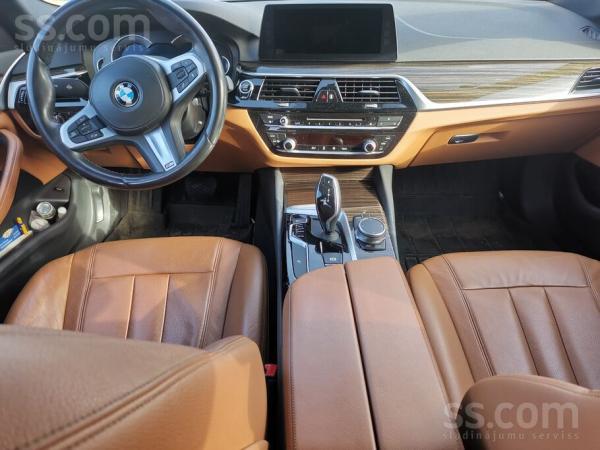 Blue BMW 520 2017 in Riga, with an engine capacity of 2.00 L and mileage of 180 thousand km for 19500 €, photo 8 on AUTOMOTO.COM.LV