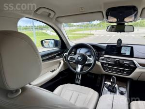 Blue BMW 520 2017 in Rezekne, with an engine capacity of 2.00 L and mileage of 181 thousand km for 22590 €, photo 18 on AUTOMOTO.COM.LV