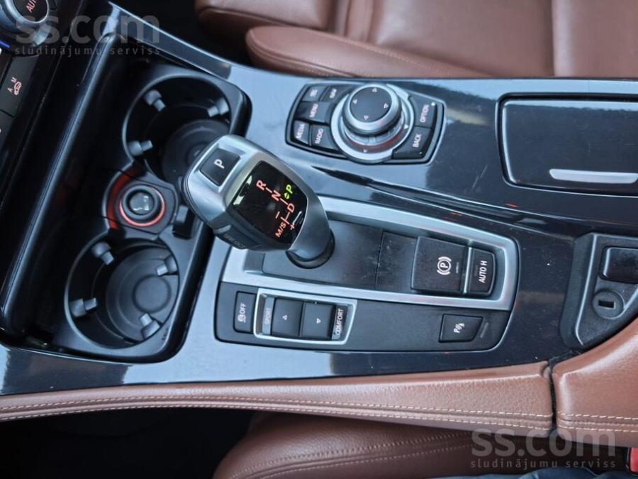 Blue BMW 520 2013 in Jelgava, with an engine capacity of 2.00 L and mileage of 287 thousand km for 8790 €, photo 14 on AUTOMOTO.COM.LV