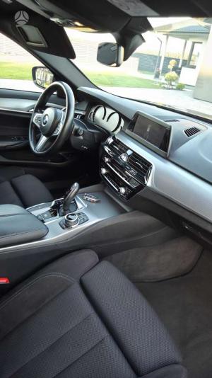 Blue BMW 520 2017 in Kaunas, with an engine capacity of 2.00 L and mileage of 210 thousand km for 16700 €, photo 12 on AUTOMOTO.COM.LV