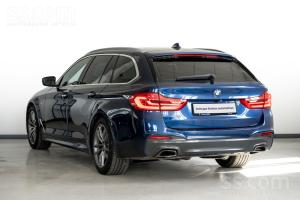 Blue BMW 520 2017 in Riga, with an engine capacity of 2.00 L and mileage of 217 thousand km for 18990 €, photo 4 on AUTOMOTO.COM.LV