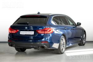 Blue BMW 520 2017 in Riga, with an engine capacity of 2.00 L and mileage of 217 thousand km for 18990 €, photo 5 on AUTOMOTO.COM.LV