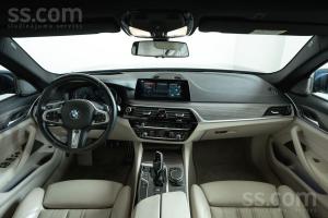 Blue BMW 520 2017 in Riga, with an engine capacity of 2.00 L and mileage of 217 thousand km for 18990 €, photo 6 on AUTOMOTO.COM.LV