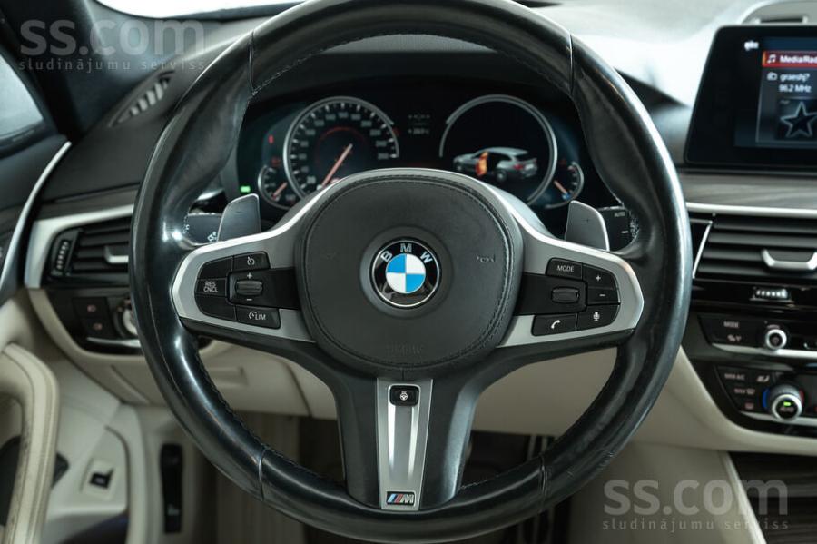 Blue BMW 520 2017 in Riga, with an engine capacity of 2.00 L and mileage of 217 thousand km for 18990 €, photo 12 on AUTOMOTO.COM.LV
