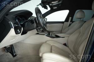 Blue BMW 520 2017 in Riga, with an engine capacity of 2.00 L and mileage of 217 thousand km for 18990 €, photo 13 on AUTOMOTO.COM.LV