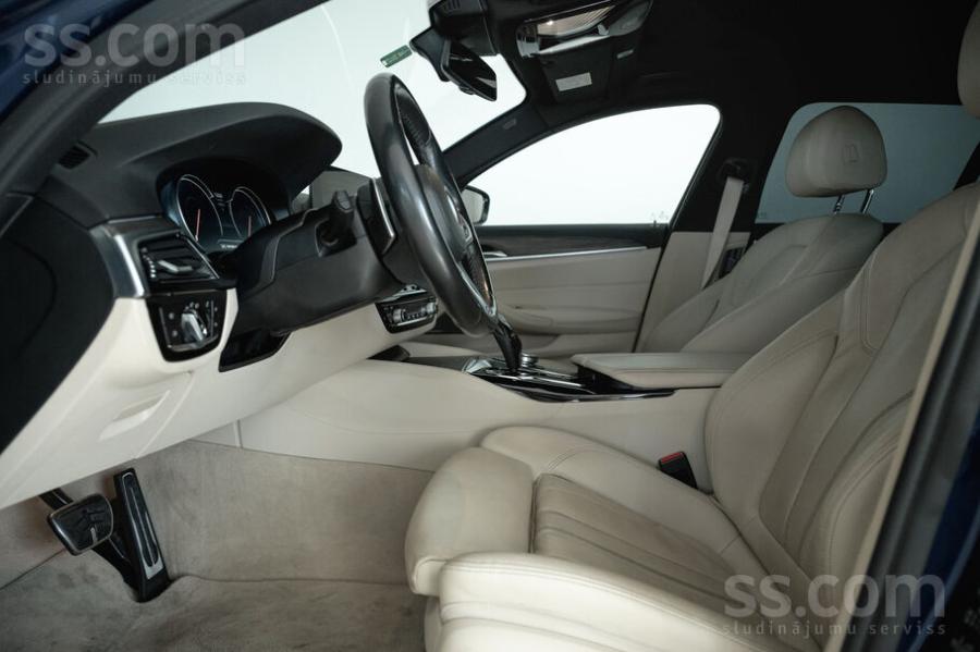 Blue BMW 520 2017 in Riga, with an engine capacity of 2.00 L and mileage of 217 thousand km for 18990 €, photo 13 on AUTOMOTO.COM.LV