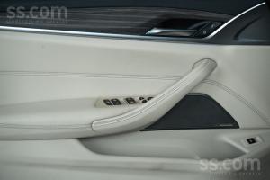 Blue BMW 520 2017 in Riga, with an engine capacity of 2.00 L and mileage of 217 thousand km for 18990 €, photo 17 on AUTOMOTO.COM.LV