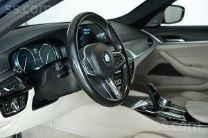 Blue BMW 520 2017 in Riga, with an engine capacity of 2.00 L and mileage of 217 thousand km for 18990 €, photo 23 on AUTOMOTO.COM.LV