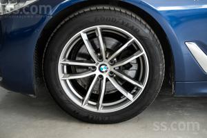 Blue BMW 520 2017 in Riga, with an engine capacity of 2.00 L and mileage of 217 thousand km for 18990 €, photo 26 on AUTOMOTO.COM.LV