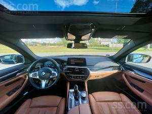 Blue BMW 520 2018 in Riga, with an engine capacity of 2.00 L and mileage of 193 thousand km for 19900 €, photo 13 on AUTOMOTO.COM.LV
