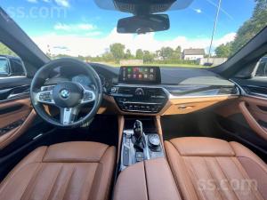 Blue BMW 520 2018 in Riga, with an engine capacity of 2.00 L and mileage of 193 thousand km for 19900 €, photo 14 on AUTOMOTO.COM.LV