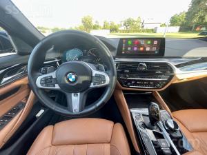 Blue BMW 520 2018 in Riga, with an engine capacity of 2.00 L and mileage of 193 thousand km for 19900 €, photo 15 on AUTOMOTO.COM.LV