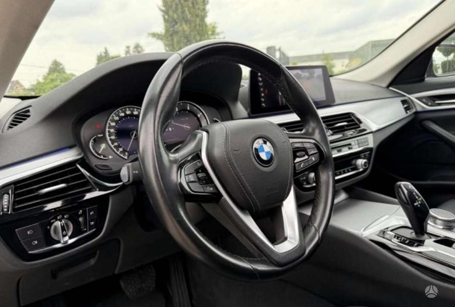 Blue BMW 520 2019 in Kaunas, with an engine capacity of 2.00 L and mileage of 275 thousand km for 13900 €, photo 12 on AUTOMOTO.COM.LV