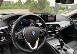 Blue BMW 520 2019 in Kaunas, with an engine capacity of 2.00 L and mileage of 275 thousand km for 13900 €, photo 13 on AUTOMOTO.COM.LV