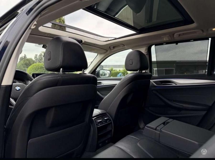Blue BMW 520 2019 in Kaunas, with an engine capacity of 2.00 L and mileage of 275 thousand km for 13900 €, photo 15 on AUTOMOTO.COM.LV