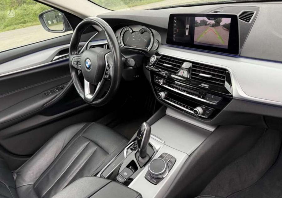 Blue BMW 520 2019 in Kaunas, with an engine capacity of 2.00 L and mileage of 275 thousand km for 13900 €, photo 18 on AUTOMOTO.COM.LV
