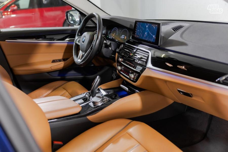 Blue BMW 520 2019 in Vilnius, with an engine capacity of 2.00 L and mileage of 217 thousand km for 19771 €, photo 19 on AUTOMOTO.COM.LV