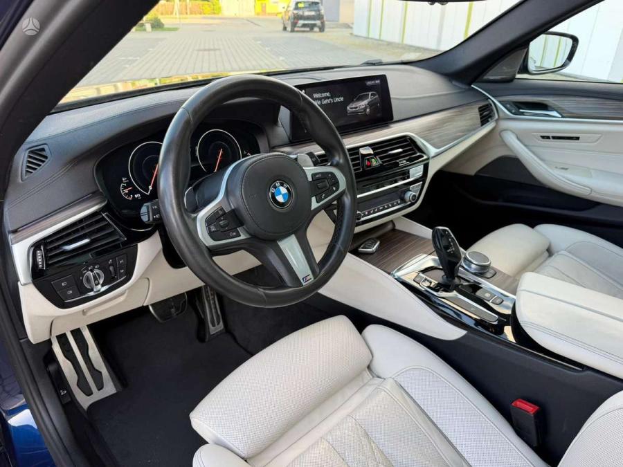 Blue BMW 520 2019 in Raseiniai, with an engine capacity of 2.00 L and mileage of 198 thousand km for 18000 €, photo 10 on AUTOMOTO.COM.LV