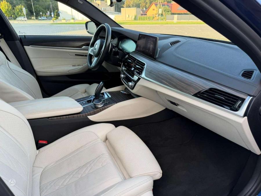 Blue BMW 520 2019 in Raseiniai, with an engine capacity of 2.00 L and mileage of 198 thousand km for 18000 €, photo 14 on AUTOMOTO.COM.LV