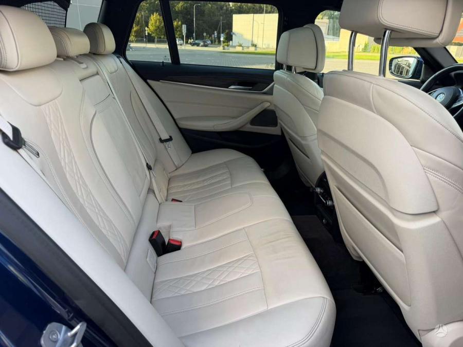 Blue BMW 520 2019 in Raseiniai, with an engine capacity of 2.00 L and mileage of 198 thousand km for 18000 €, photo 16 on AUTOMOTO.COM.LV