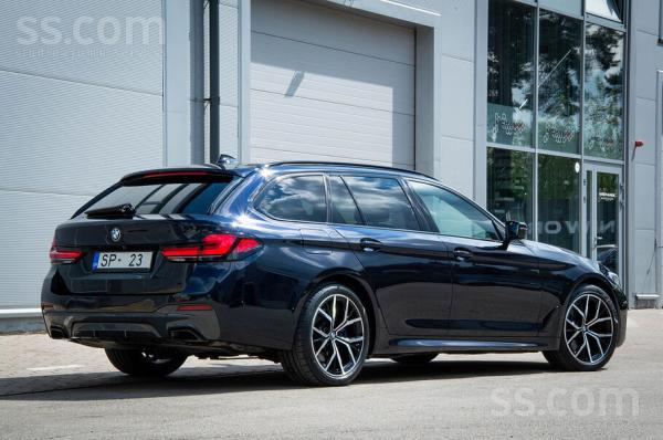 Blue BMW 520 2022 in Riga, with an engine capacity of 2.00 L and mileage of 94 thousand km for 33000 €, photo 3 on AUTOMOTO.COM.LV